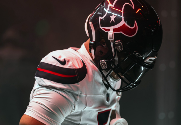 The jersey prominently displays a “Houston” wordmark above the mostly blue numbers, while the ...