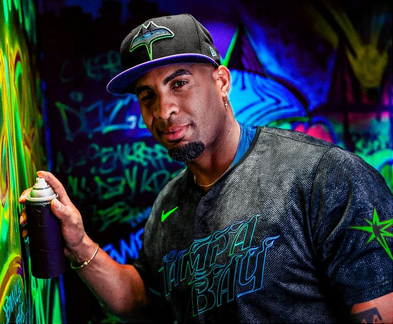 The black base of the jersey contains a pattern designed to resemble a ...