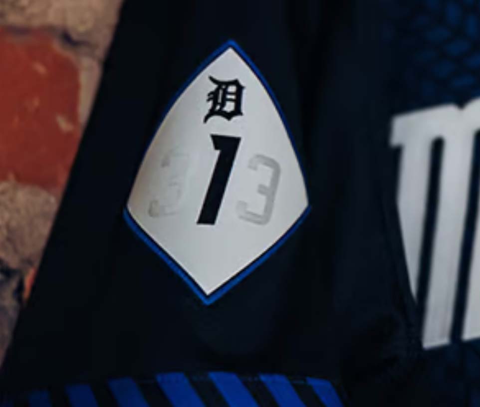 Pants, per usual in this series, are dark navy blue to match the jersey. The tire tape striping ...