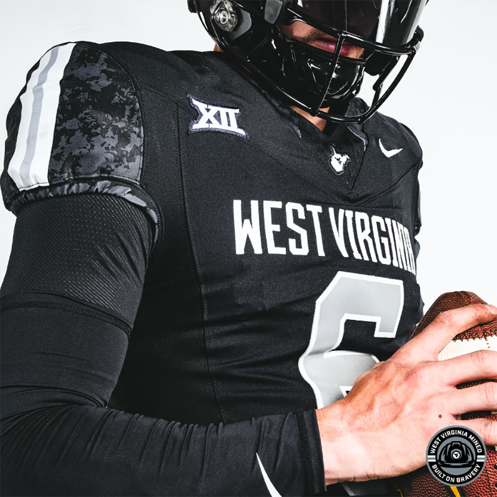 The black jerseys prominently display the same “West Virginia” wordmark ...