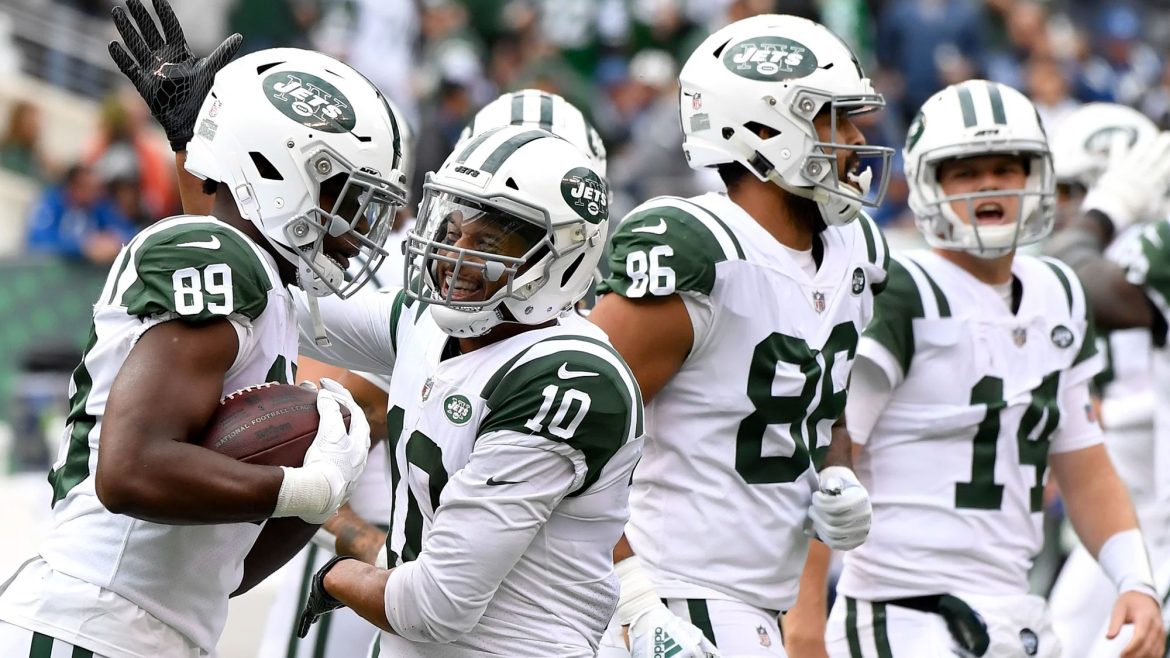 The uniforms are complete with white pants with two green stripes down ...