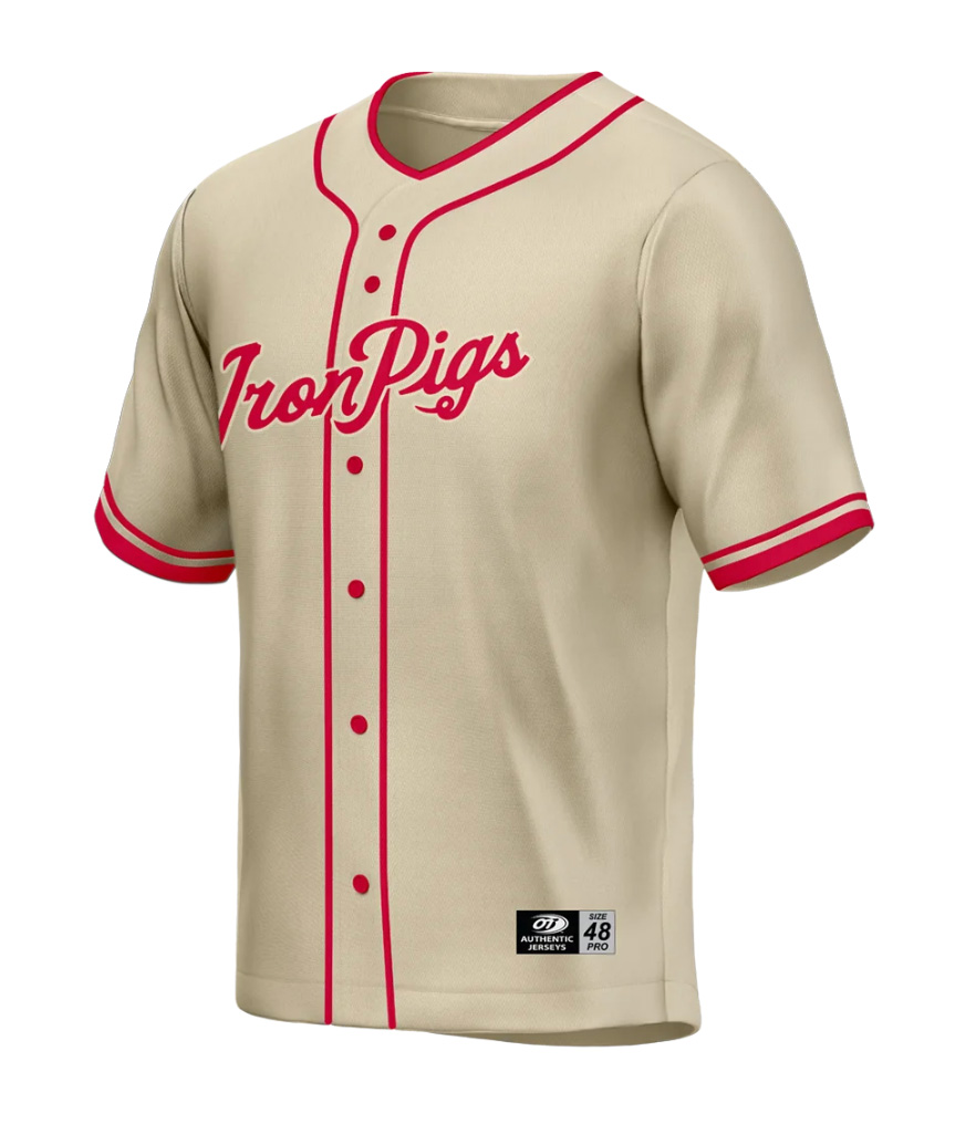 A cream-colored jersey is adorned by red piping and a script wordmark ...