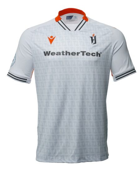 The sleeve cuffs and polo collar are white, and a white “HAMILTON ...