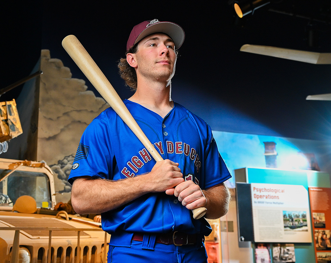 A sleeve patch on the jersey features a panther with a baseball in its ...