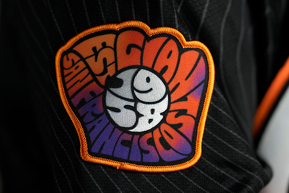 Glove patch Jersey wordmark Back jersey number Musical icon grid