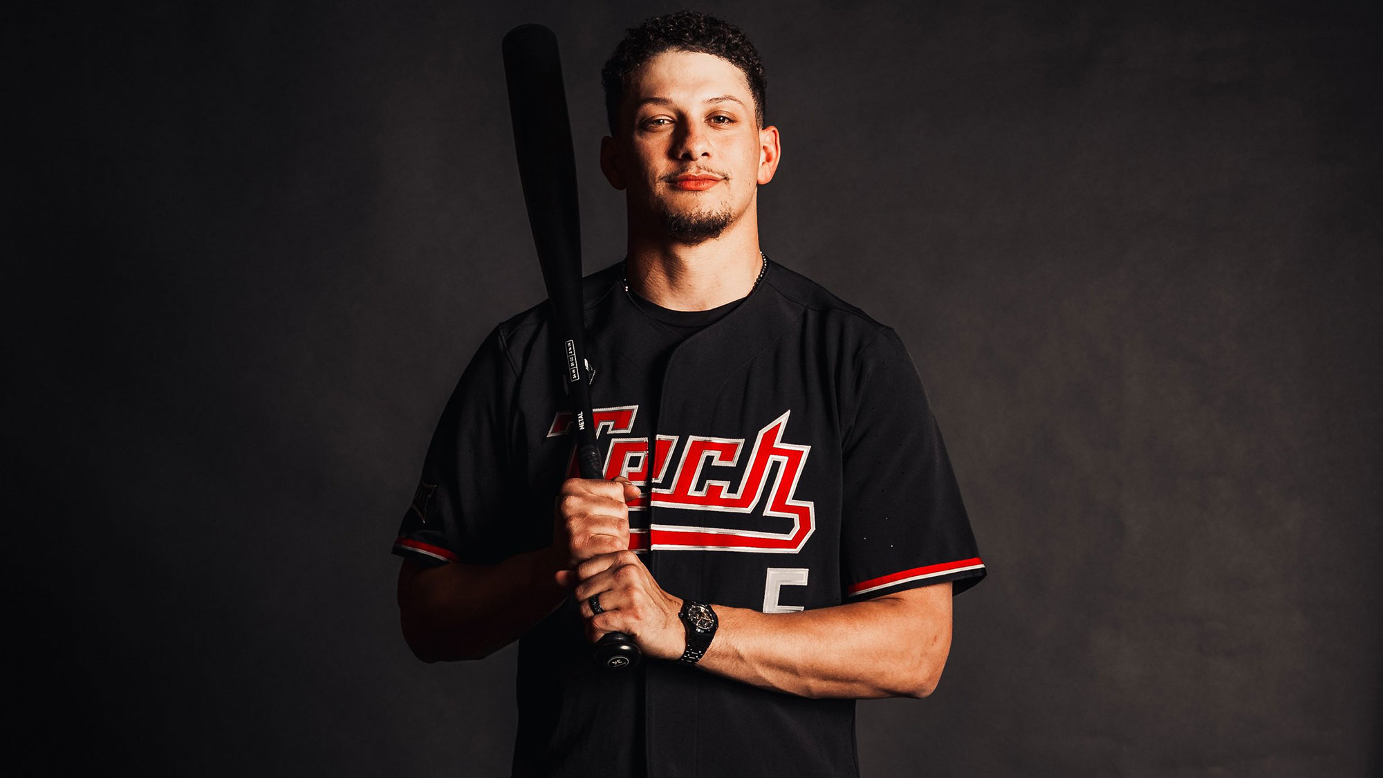 Mahomes’ “Gladiator” logo is prominently displayed on the right ...