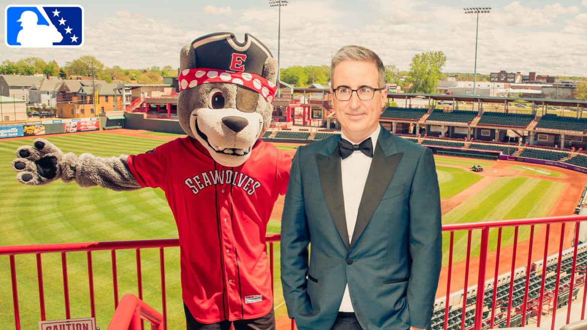 Erie SeaWolves mascot C. Wolf with John Oliver. Via MiLB