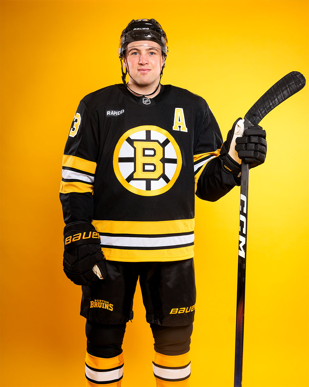 Sorry Bruins fans, no gold socks with the new home uniforms [photo via ...